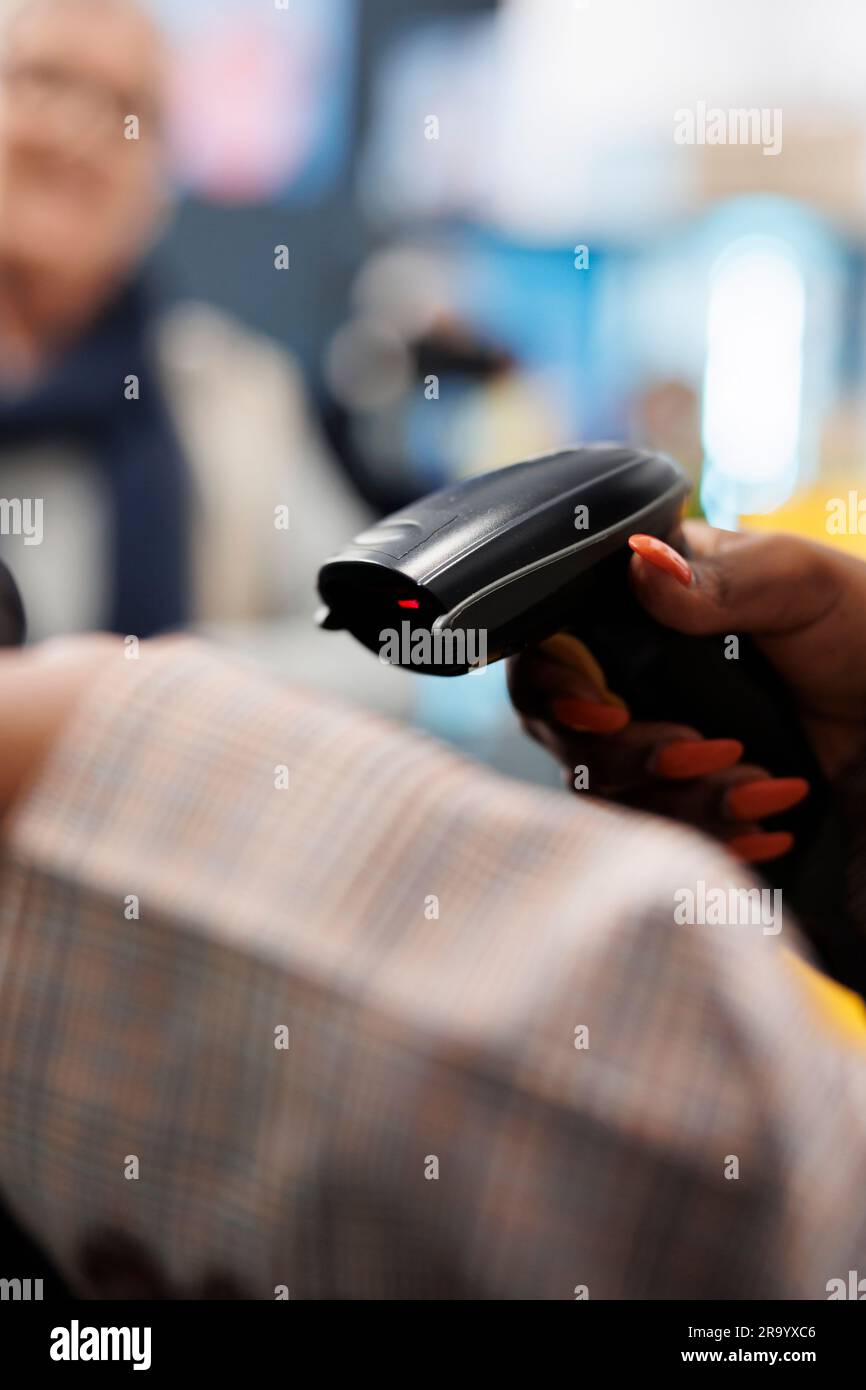 African american employee scanning hi-res stock photography and images ...