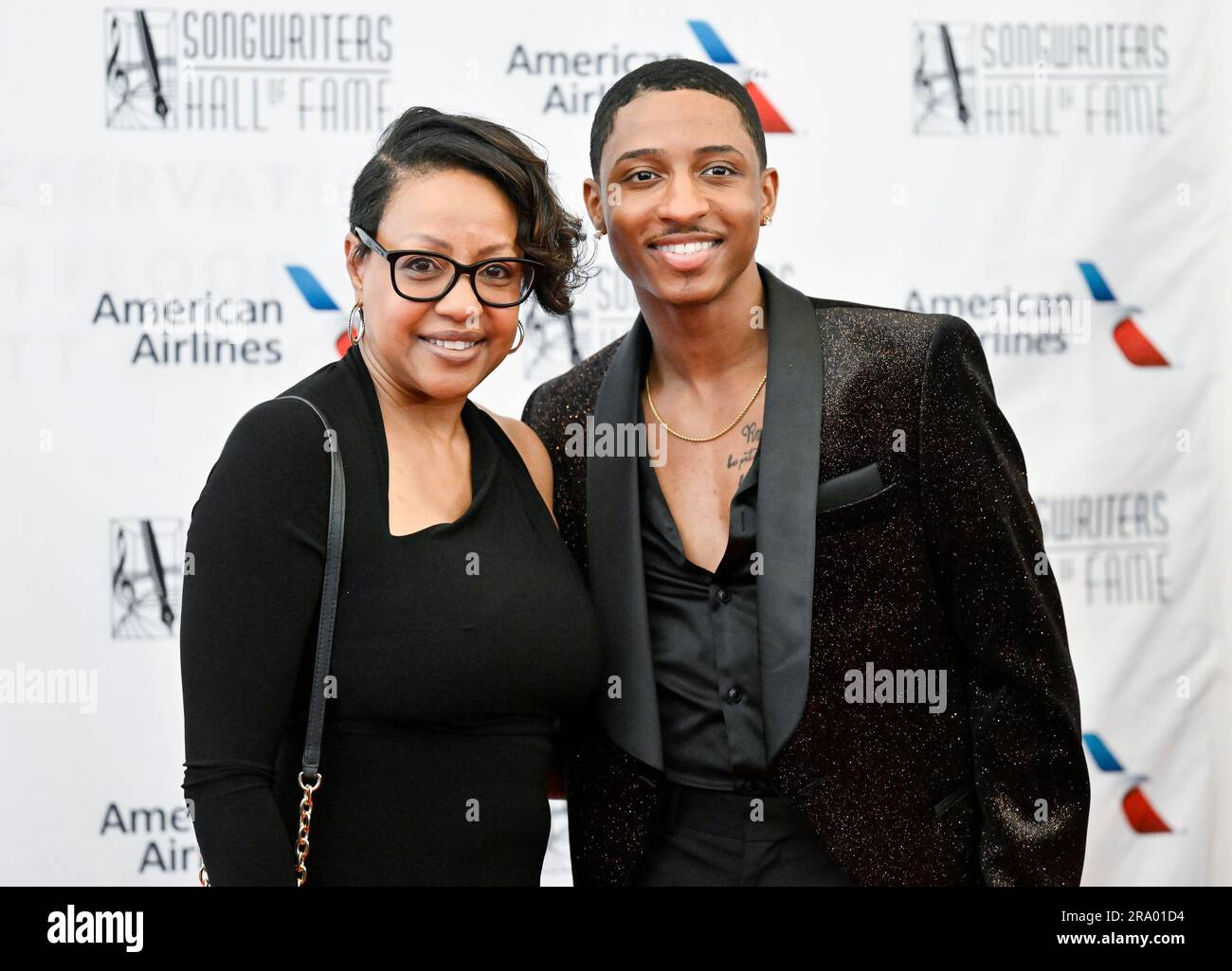 Myles Frost, right, and mother Charmayne Strayhorn attend the 52nd ...