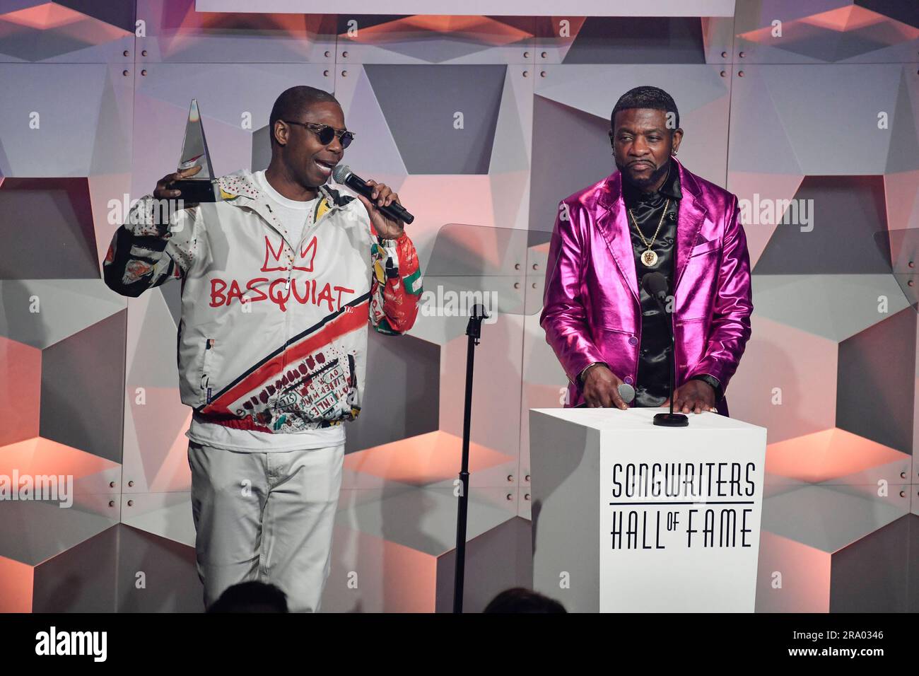 Rappers Doug E. Fresh, left, and Keith Sweat induct Teddy Riley at the ...