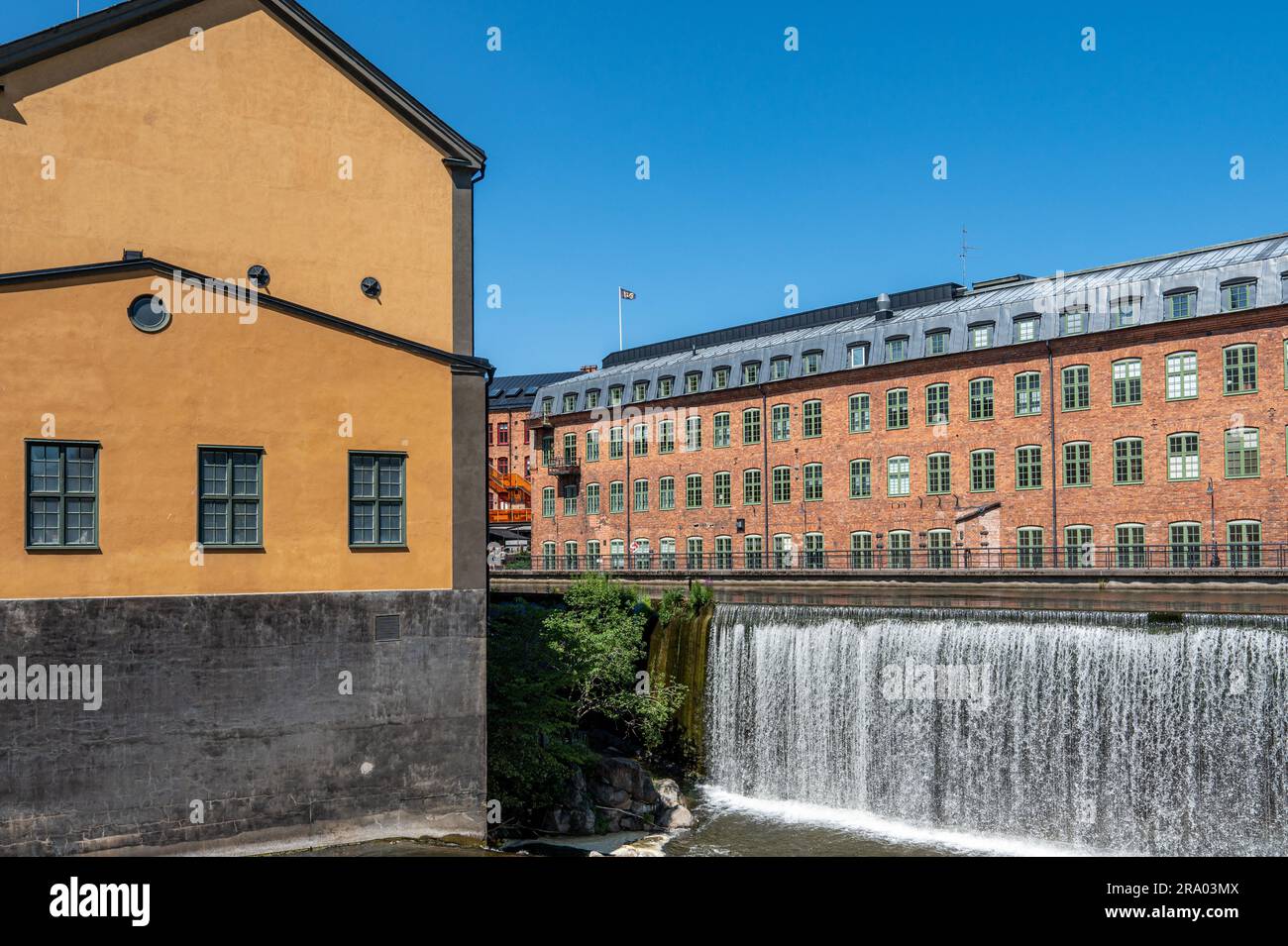Motala river and the famous industrial landscape during summer in ...