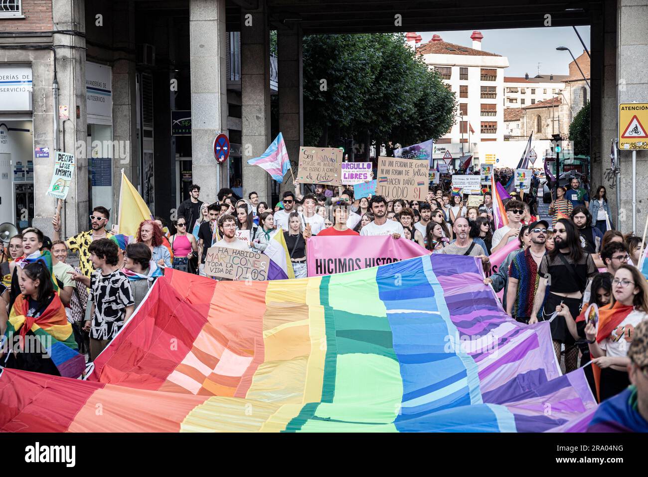 Protesters hold a rainbow flag during the pride rally. Various LGBTQ ...