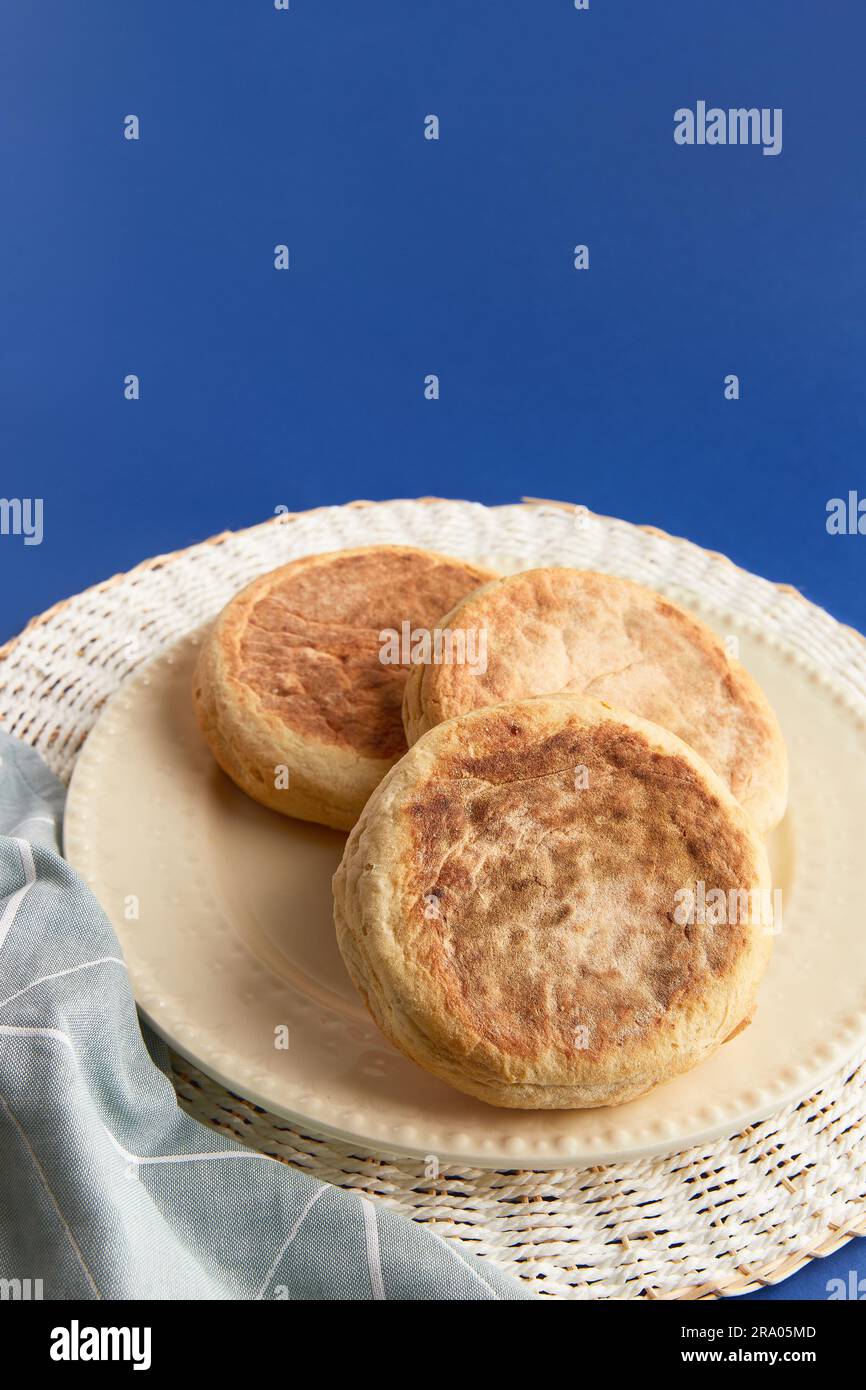 Bolo de caco. Traditional portuguese bread on blue a background Stock ...