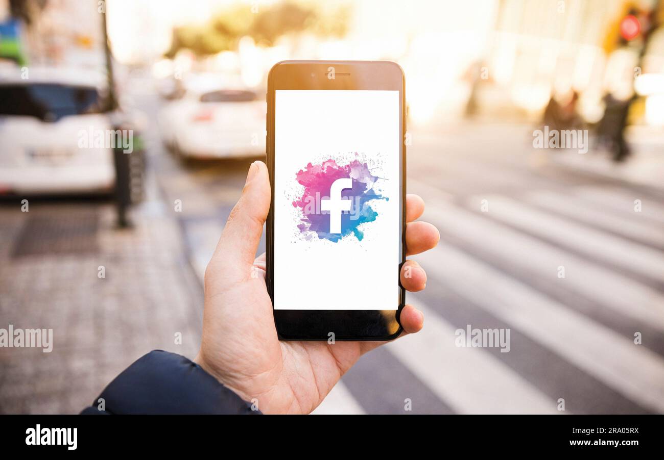 In this photo illustration, Facebook logo is displayed on the screen ...