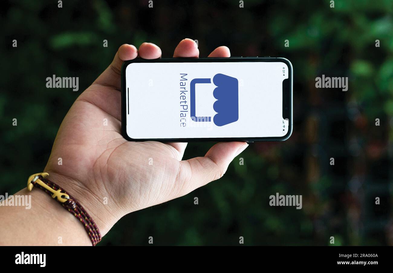 In this photo illustration, Facebook logo is displayed on the screen ...