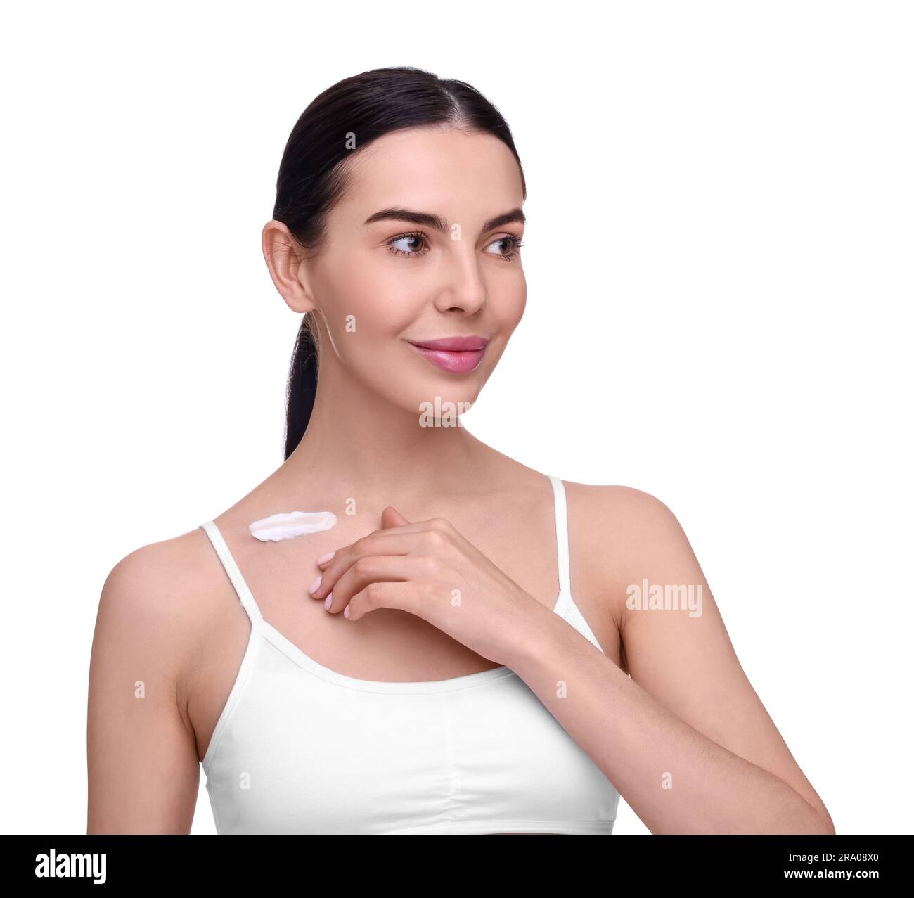 Beautiful woman with smear of body cream on her collarbone against ...