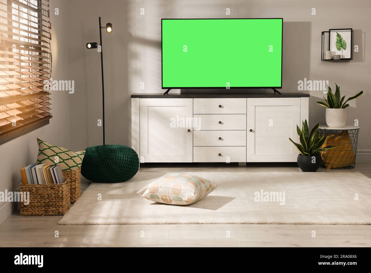 Chroma key compositing. TV with mockup green screen in room. Mockup for ...