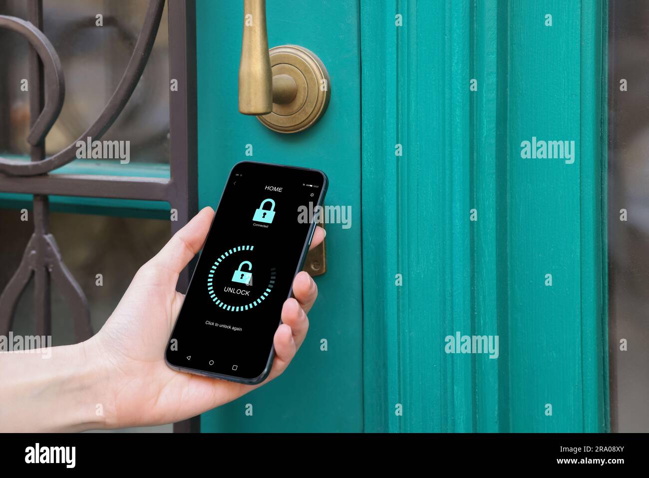 Woman unlocking door using mobile phone, closeup. Illustration of ...