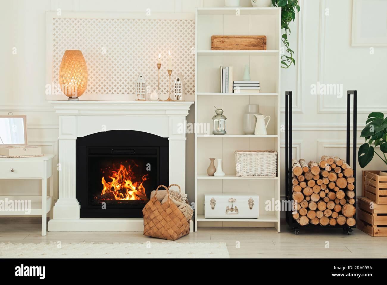 Stylish living room with beautiful fireplace and different decor ...