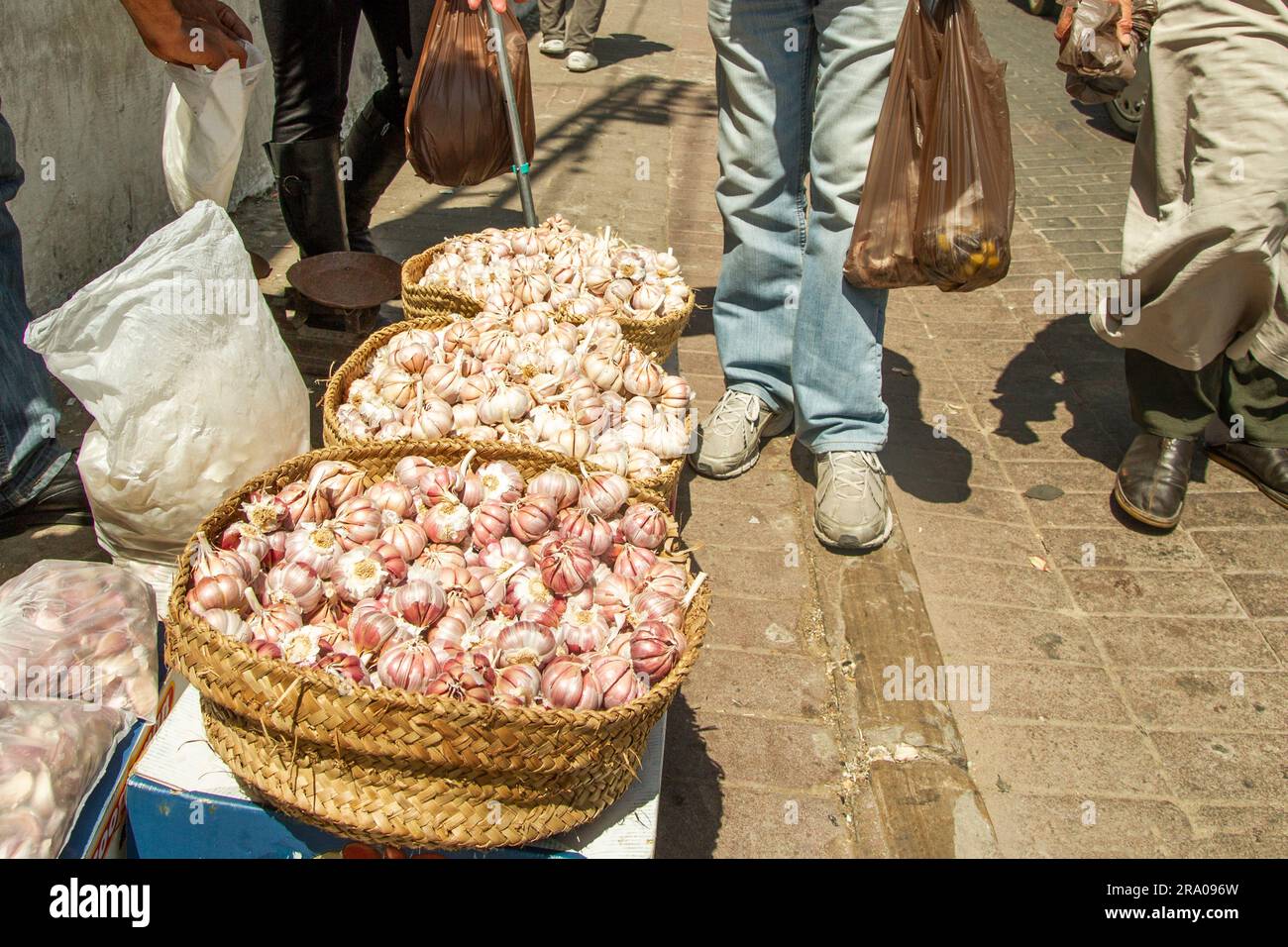 Baskets of garlic in a Moroccan street market Stock Photo - Alamy