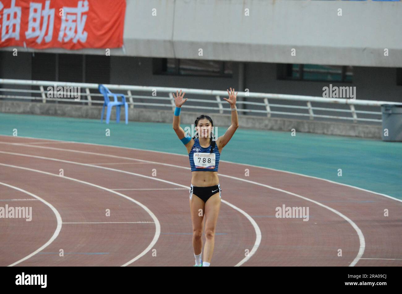 HANGZHOU, CHINA - JUNE 29, 2023 - Runners compete in the women's 100m ...