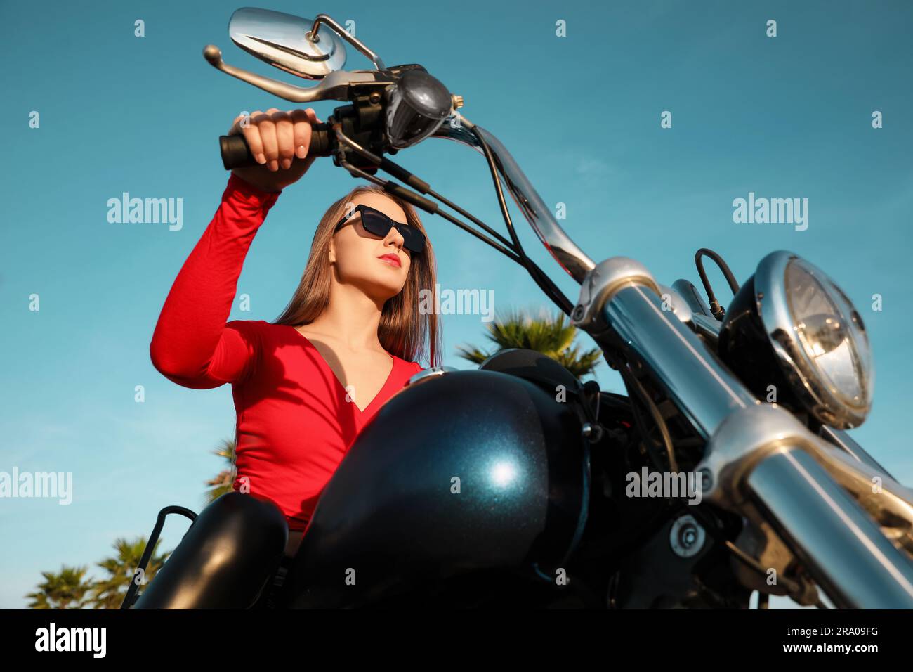 Biker riding motorcycle low angle hi-res stock photography and images ...