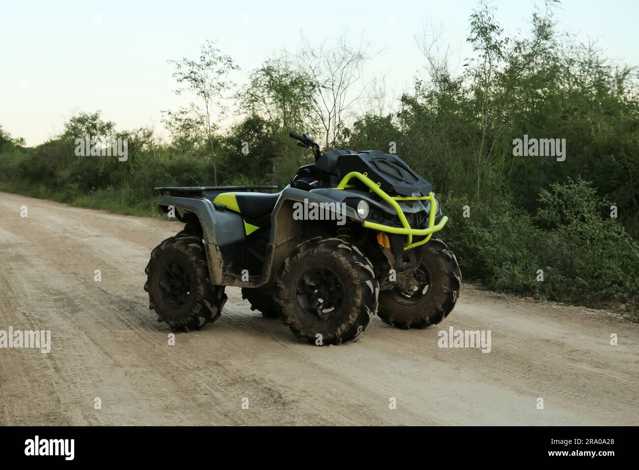 Modern fast quad bike on pathway outdoors Stock Photo - Alamy