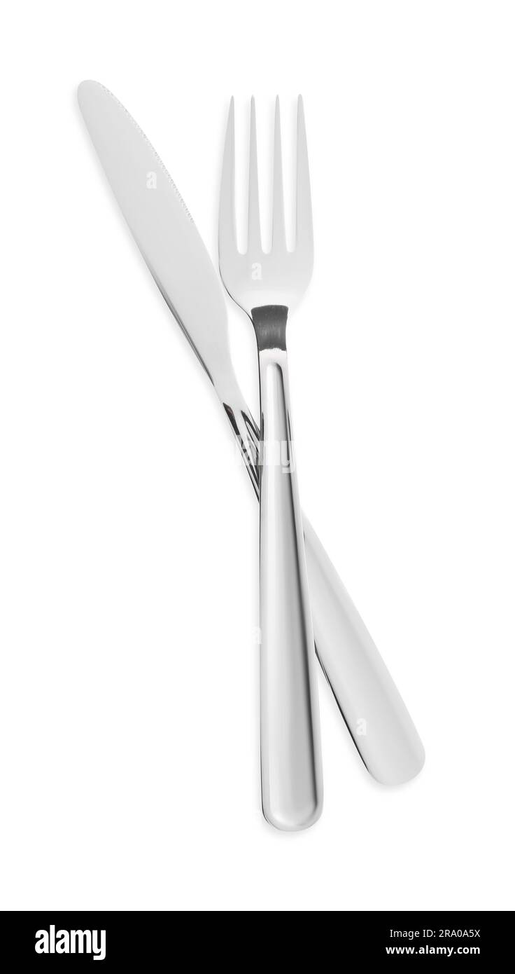 Fork and knife isolated on white, top view. Stylish shiny cutlery set ...