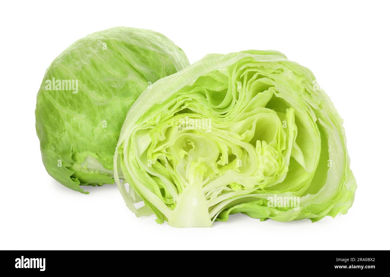 Whole and cut fresh green iceberg lettuces isolated on white Stock ...