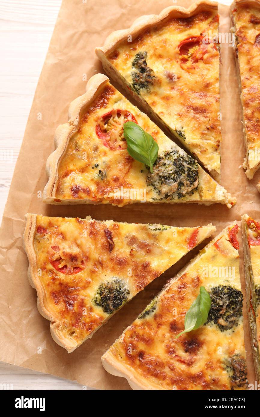 Delicious homemade vegetable quiche on parchment paper, top view Stock ...