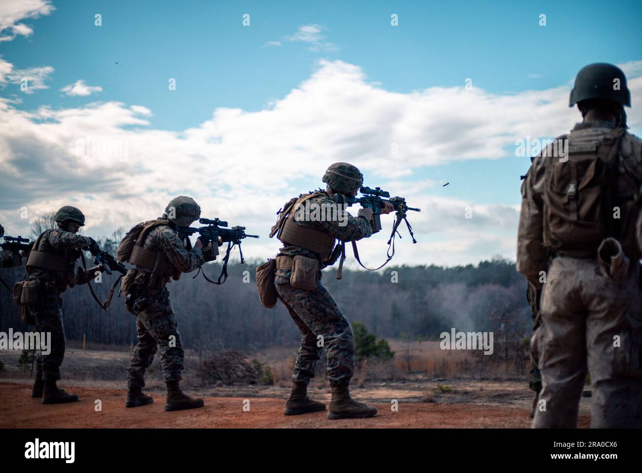 U.S. Marines participate in a squad weapons range during the Warrant ...