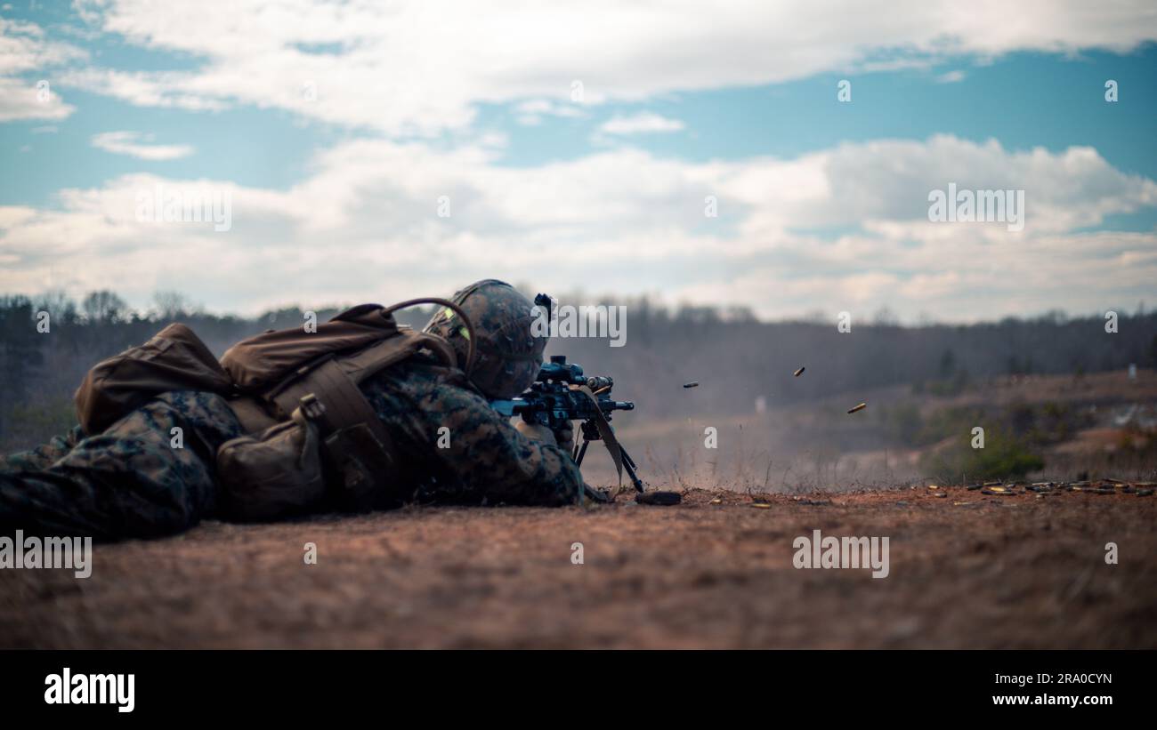U.S. Marines participate in a squad weapons range during the Warrant ...