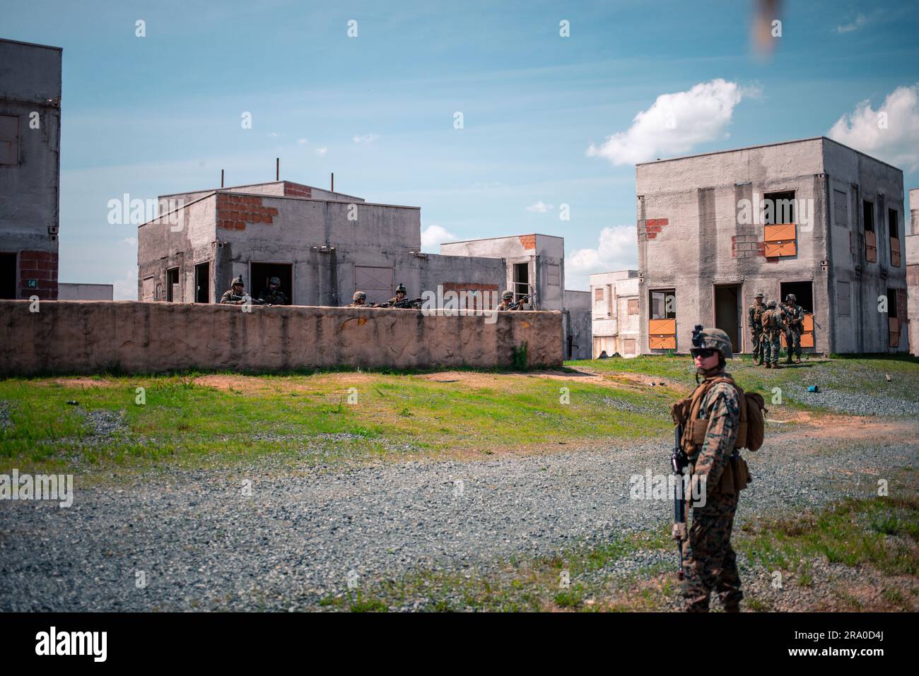 U.S. Marines provide security during the Warrant Officer Basic Course ...