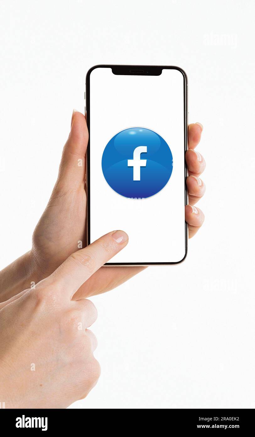 In this photo illustration, Facebook logo is displayed on the screen ...