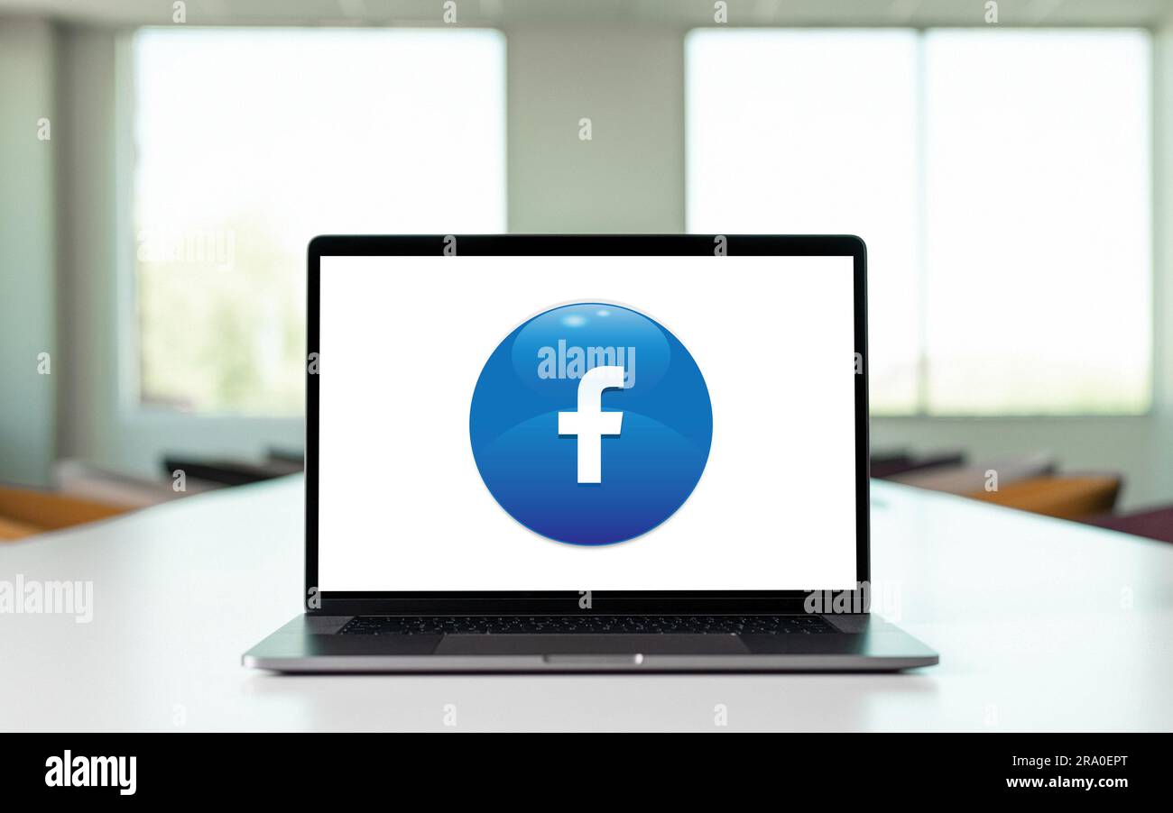In this photo illustration, Facebook logo is displayed on the screen ...