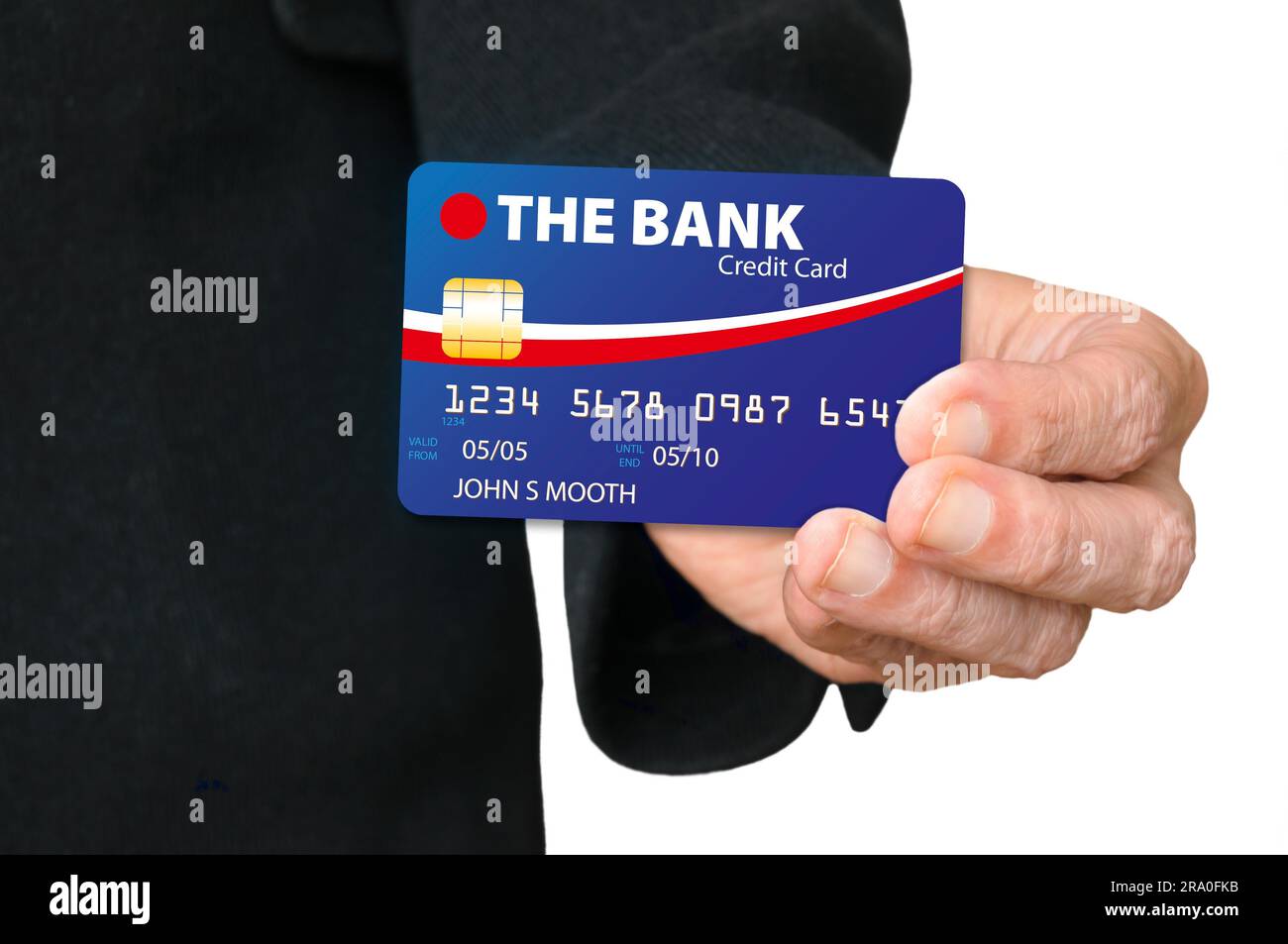 A man holding a credit card in his hand, and showing it Stock Photo - Alamy