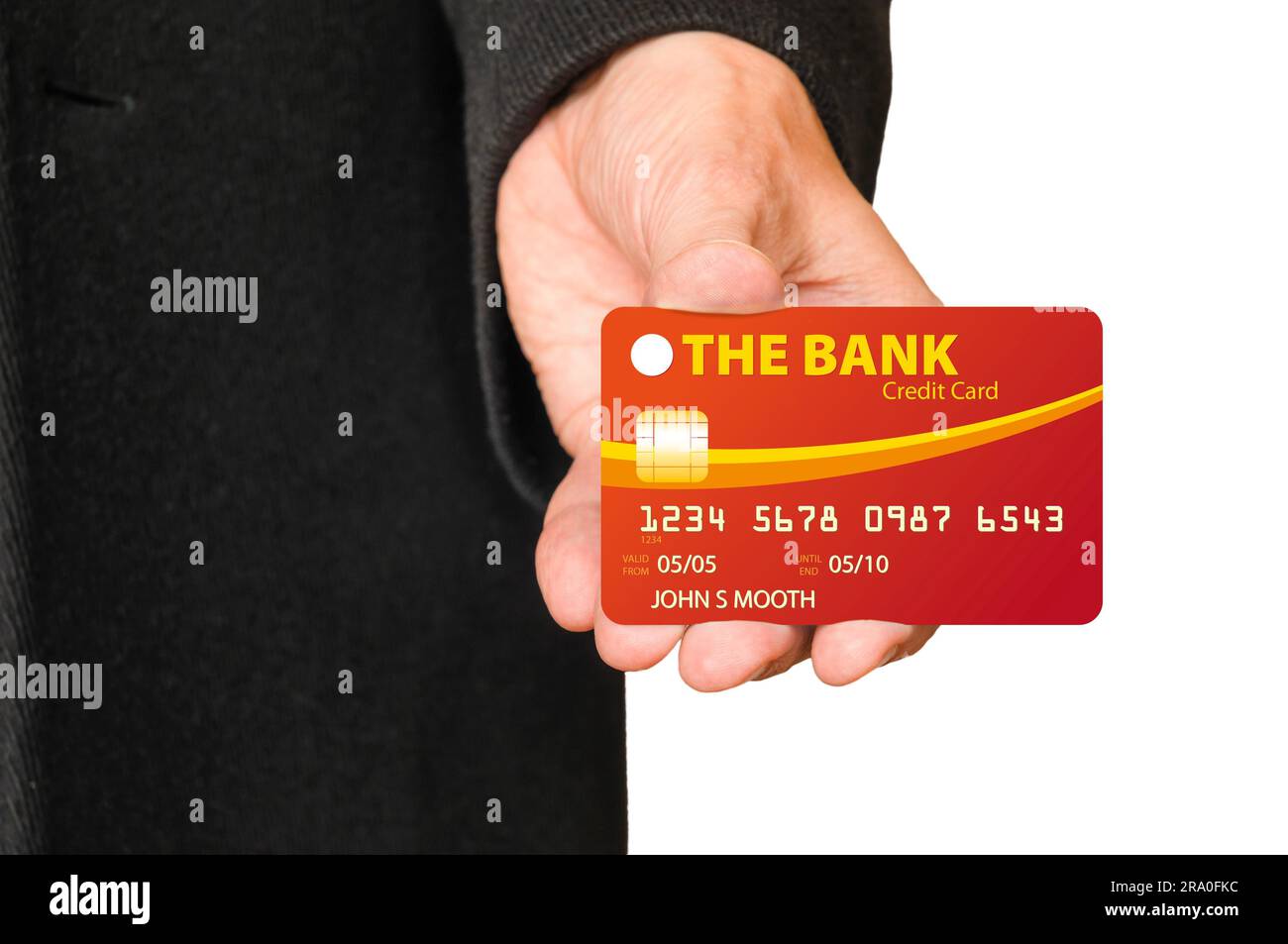 A man holding a credit card in his hand, and showing it Stock Photo - Alamy