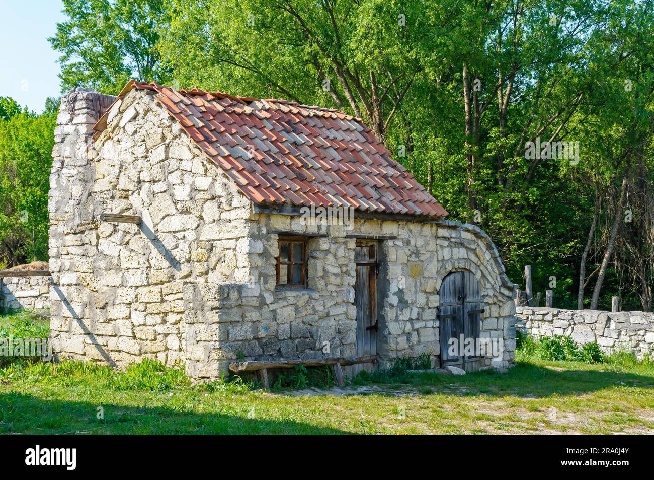 A typical ukrainian antique stone house, in Pirogovo near Kiev Stock ...
