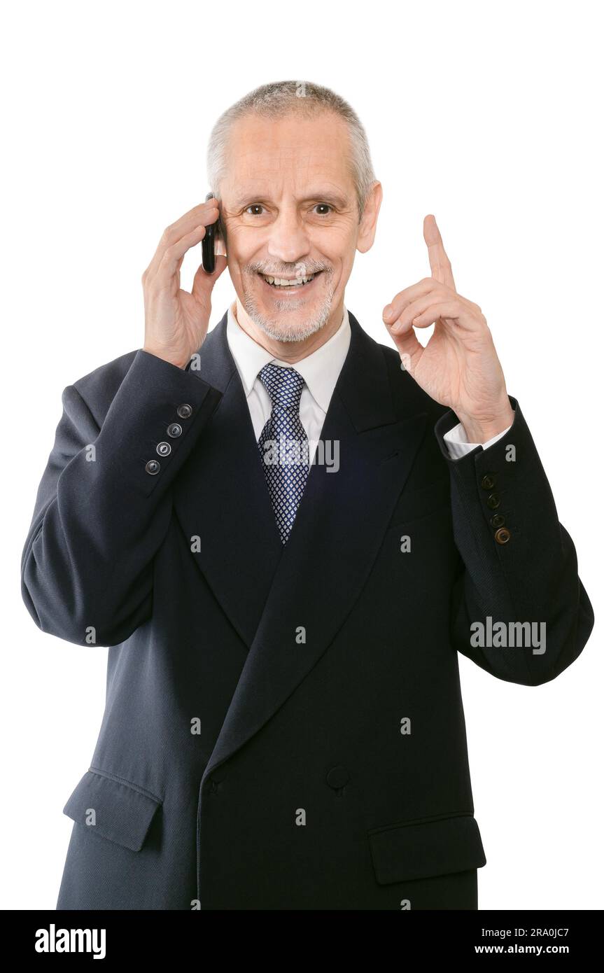 A pleasant businessman smiling on mobile phone and showing the ...