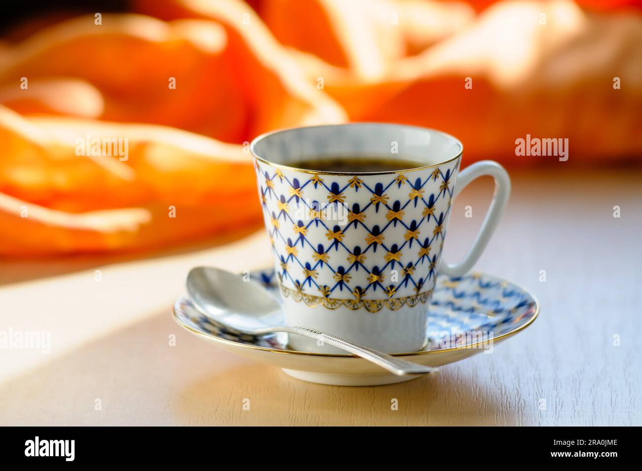 Time for a break. The Lady drinks a cup of warm and flavoured coffee ...