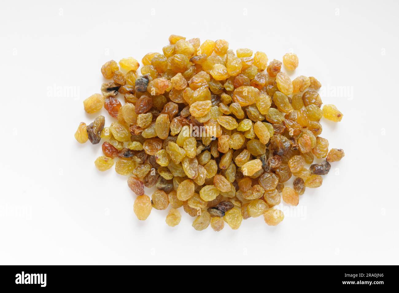 A heap of sweet dry raisin on white background Stock Photo - Alamy