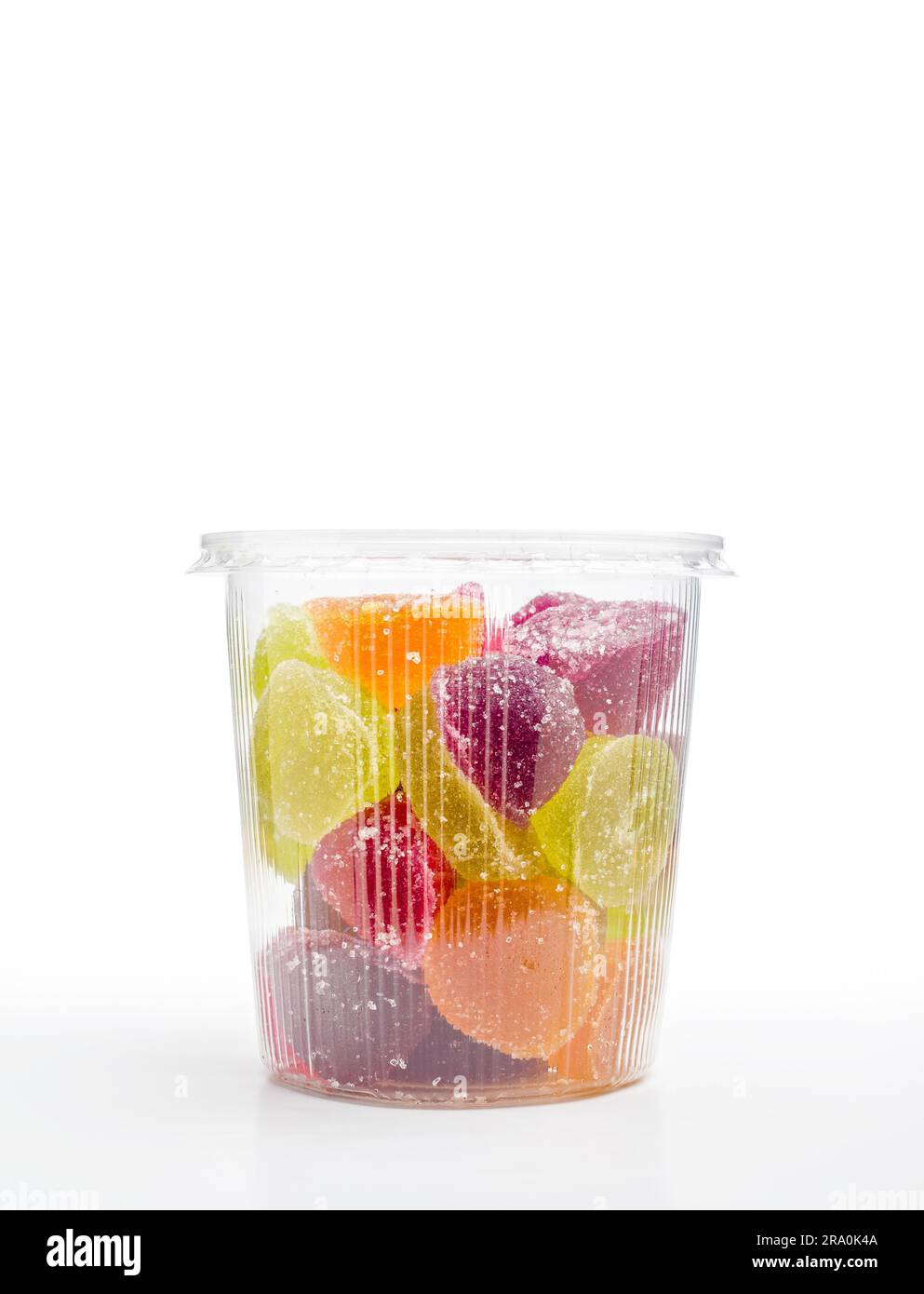 Colorful fruit jelly in foam jar, on white background Stock Photo - Alamy