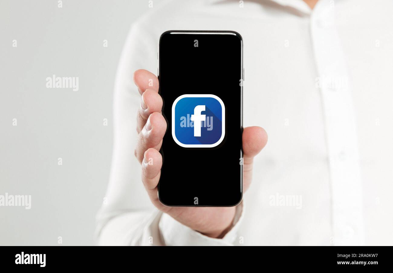 In this photo illustration, Facebook logo is displayed on the screen ...