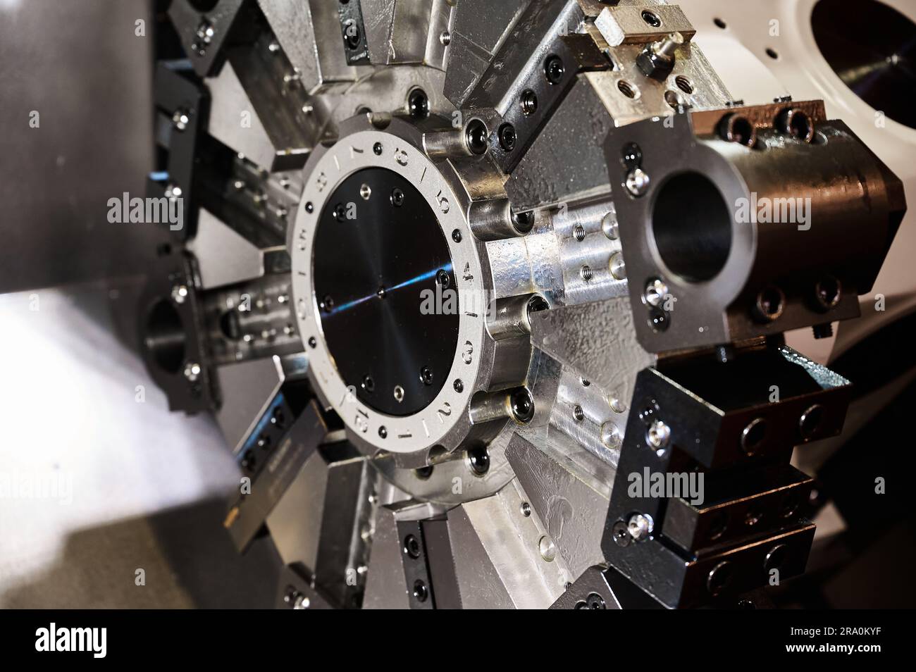 Lathe machine tool with shiny turret in production plant Stock Photo ...