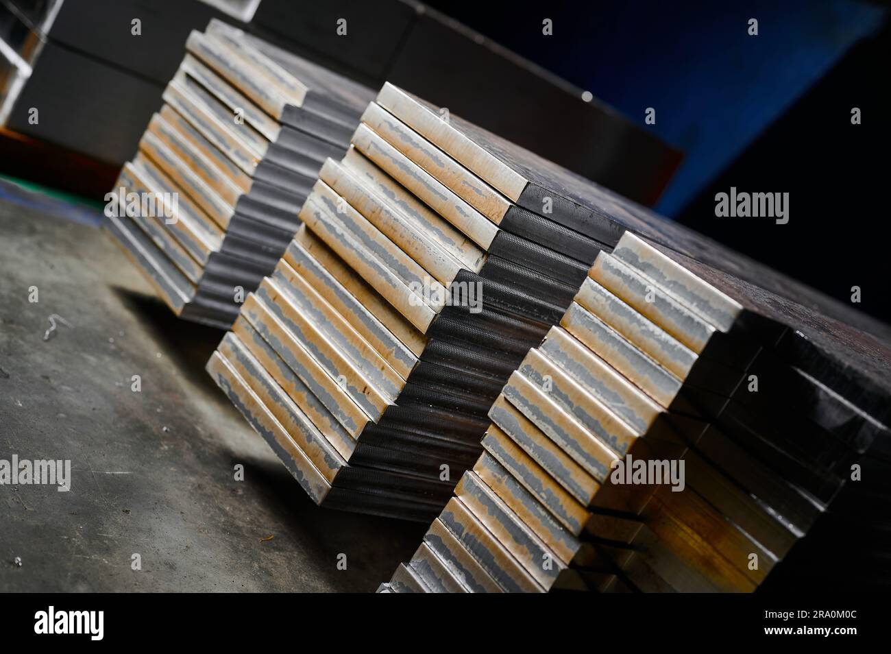 Steel details with ground edges and corners in storage Stock Photo - Alamy