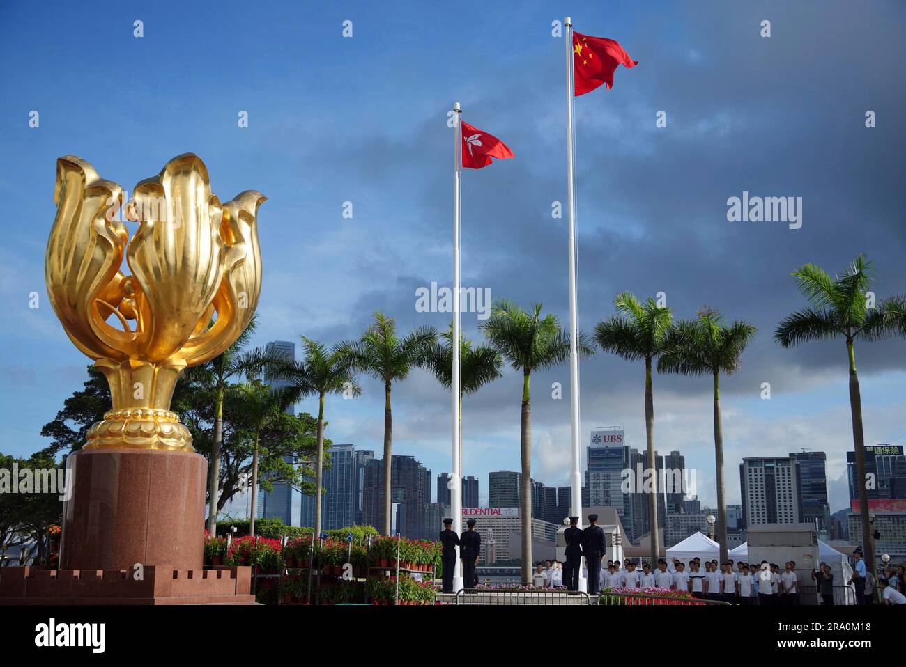 Hong Kong flag and Chinese national flag are hoisted at Golden Bauhinia ...