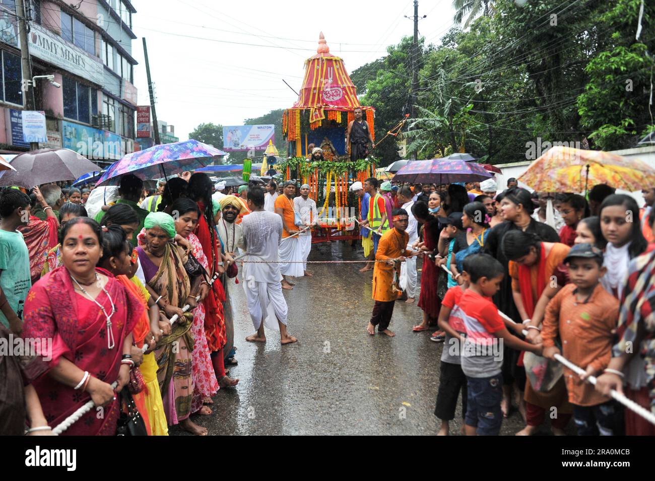 Devotees take part with a colorful Ratha Cart at the Reverse Ratha ...