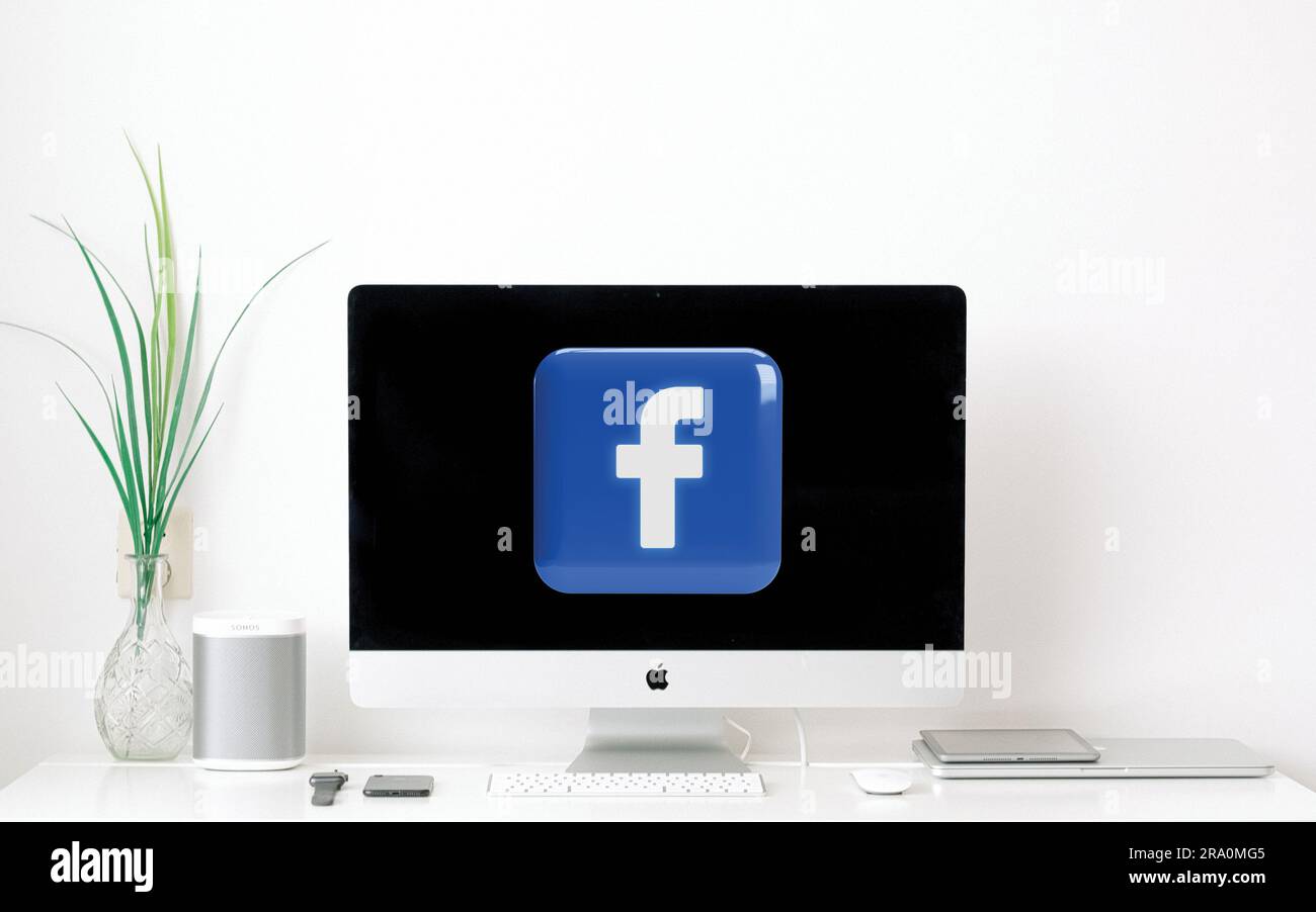 In this photo illustration, Facebook logo is displayed on the screen ...