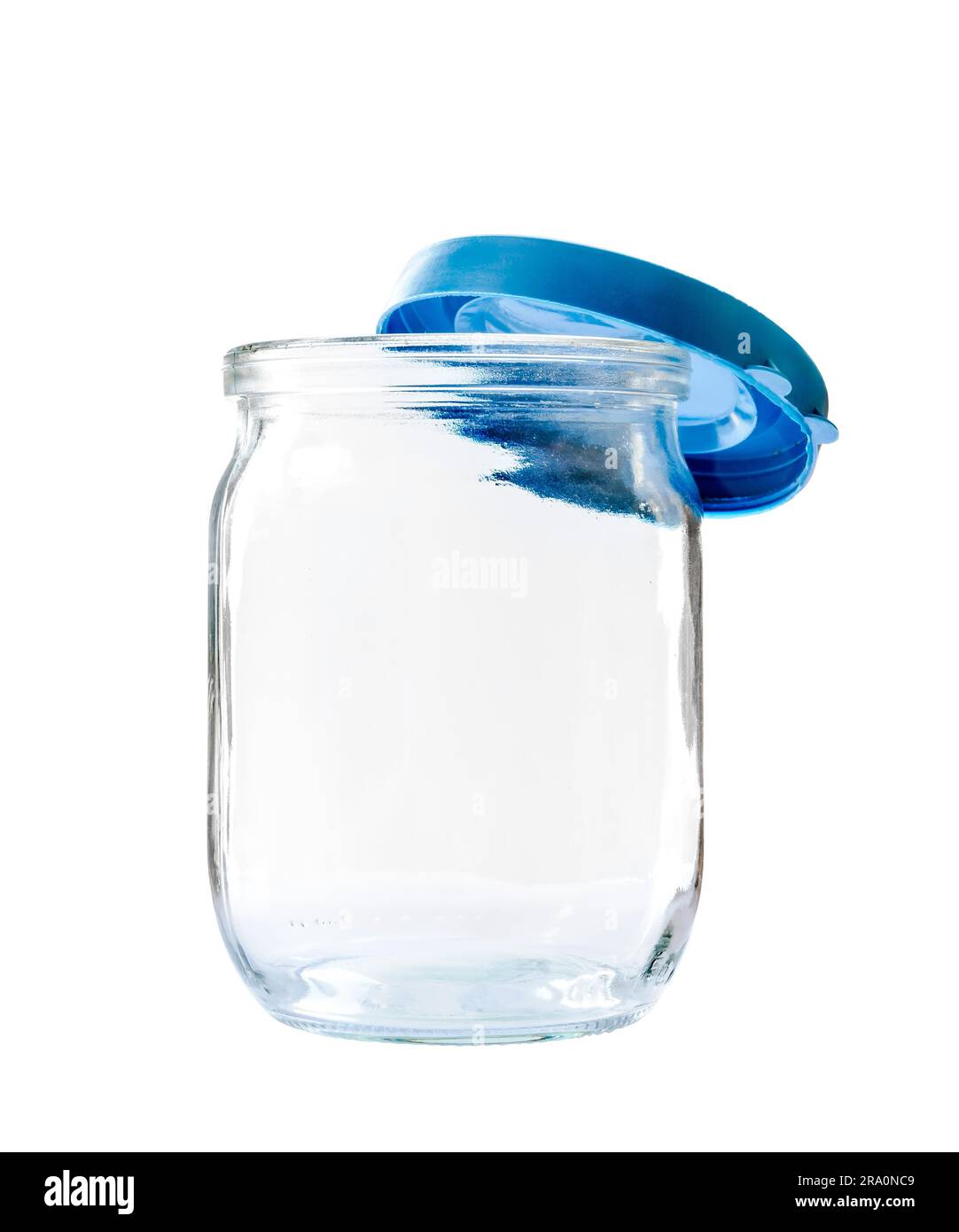 Transparent glass jar on white background, with the open plastic blue ...