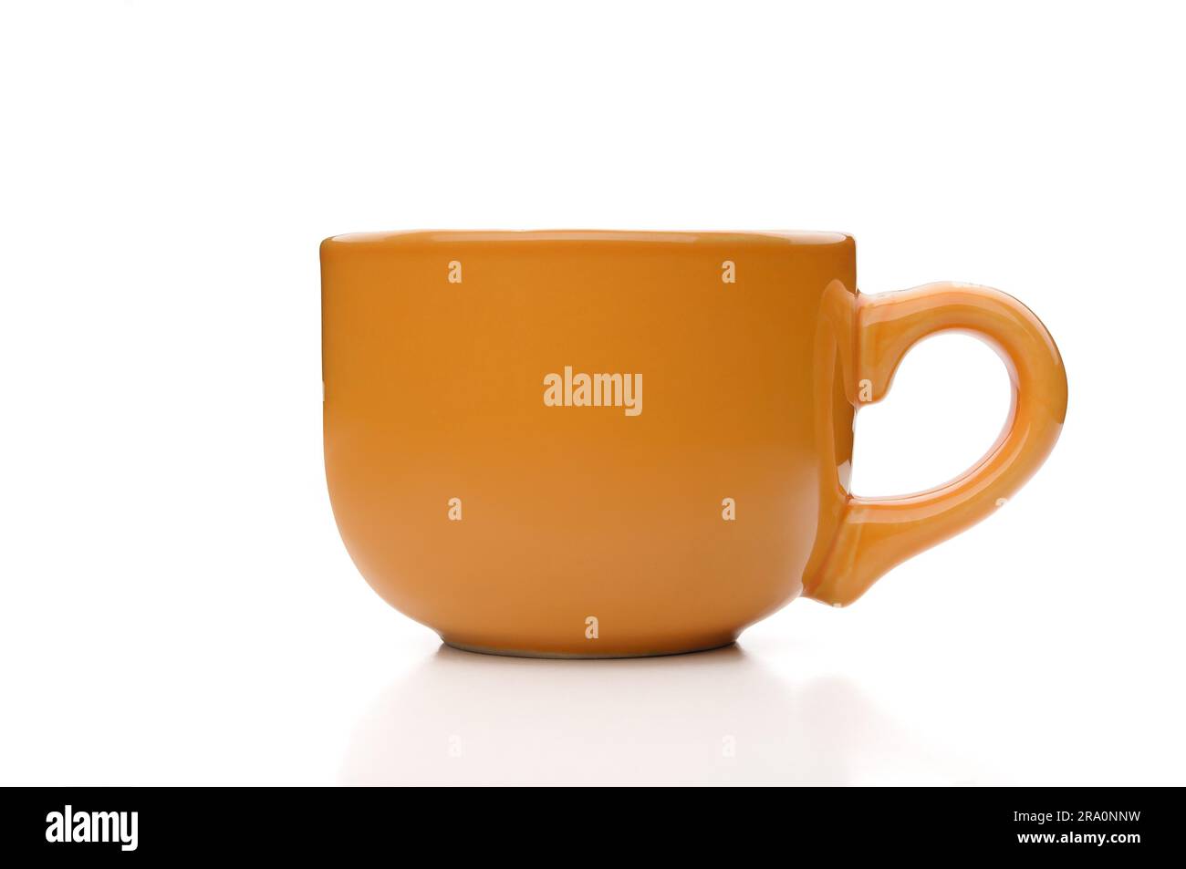 A simple orange tea cup viewed from profile Stock Photo - Alamy