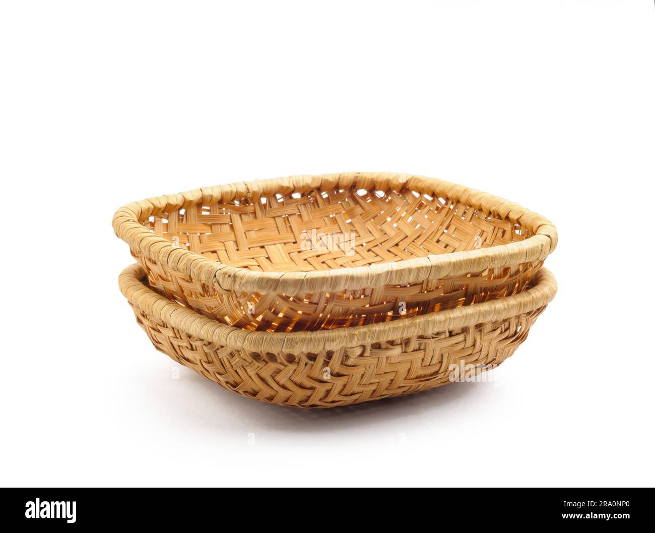 Two little wicker baskets isolated on white background Stock Photo - Alamy