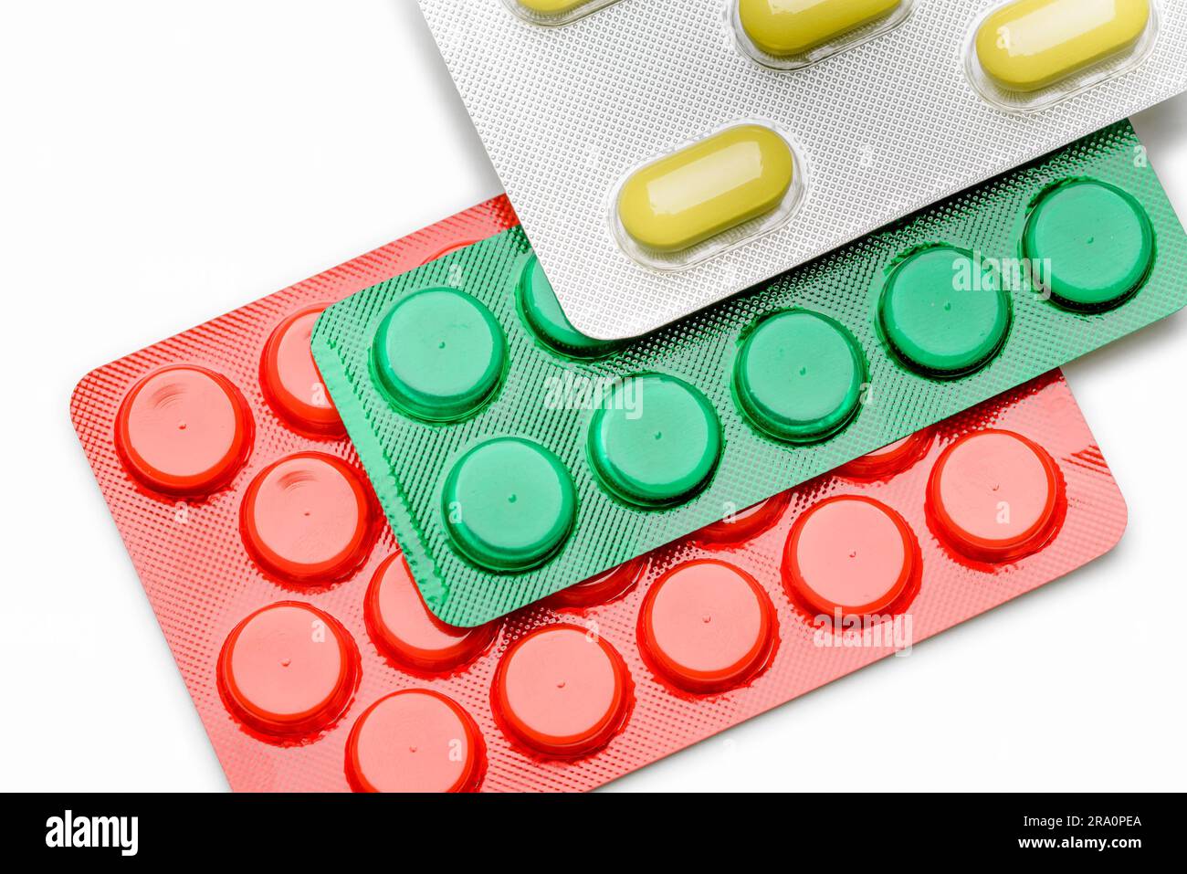 Red, yellow, green and white pills blisters of pharmacy to cure pain ...