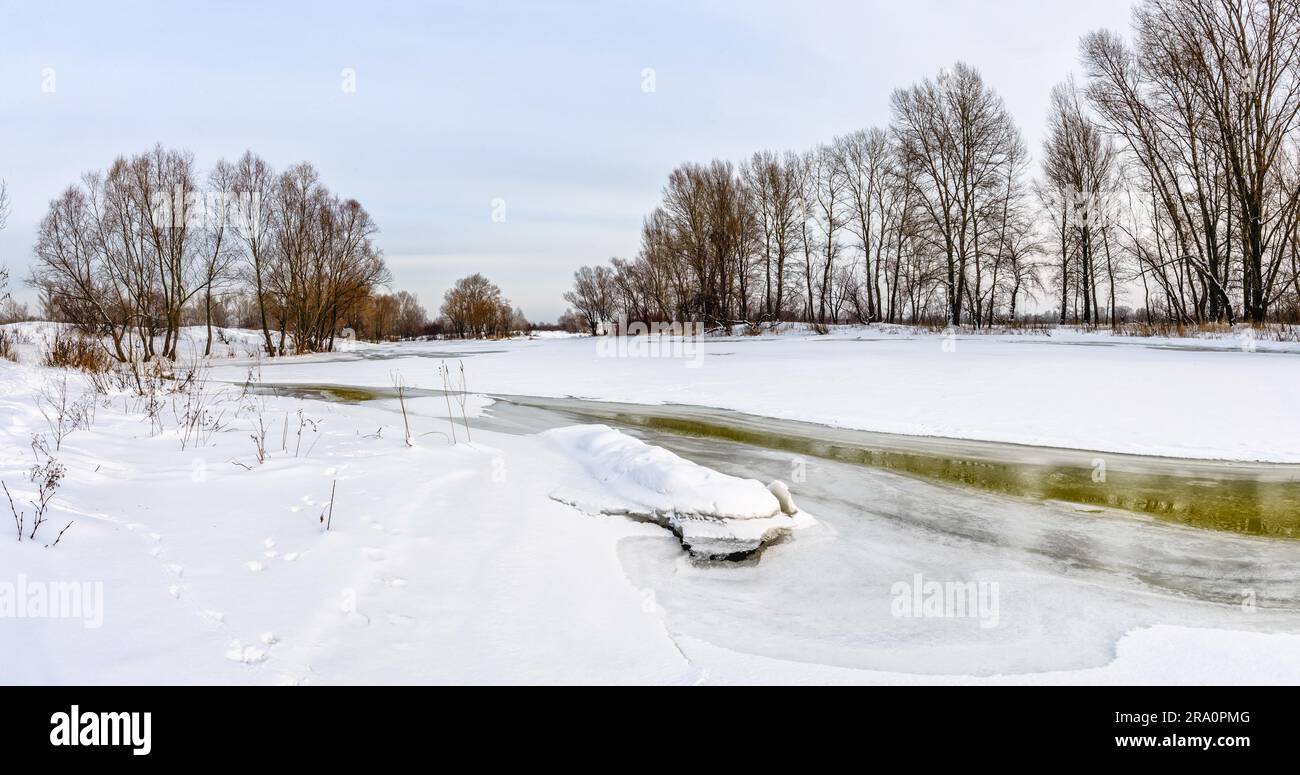 Landscape panorama with frozen water, ice and snow on the Dnieper river ...