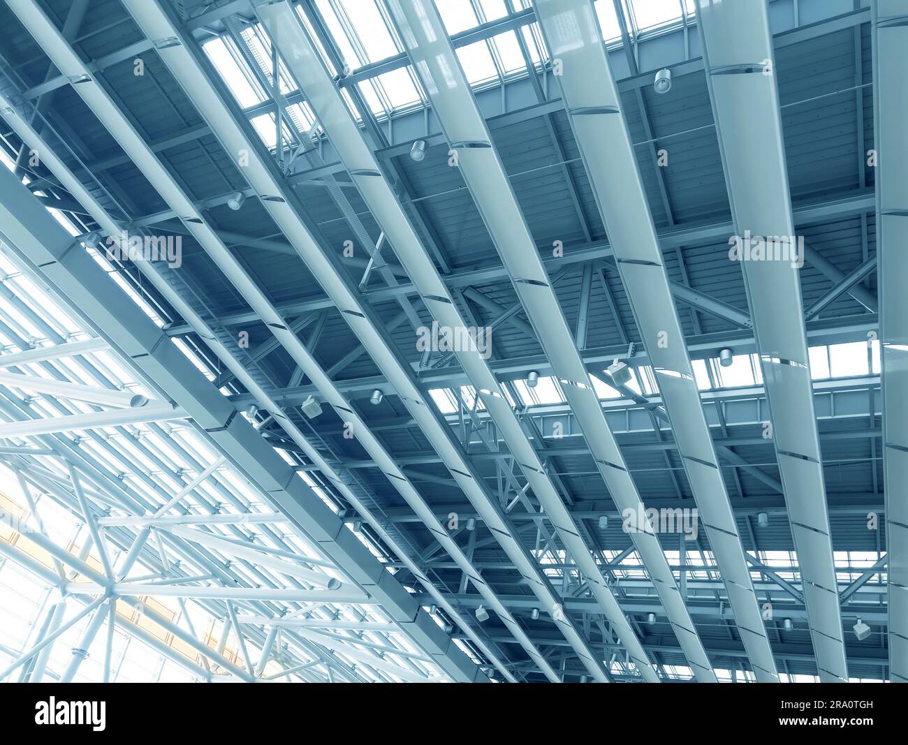 Lights and ventilation system in long line on ceiling of the industrial ...