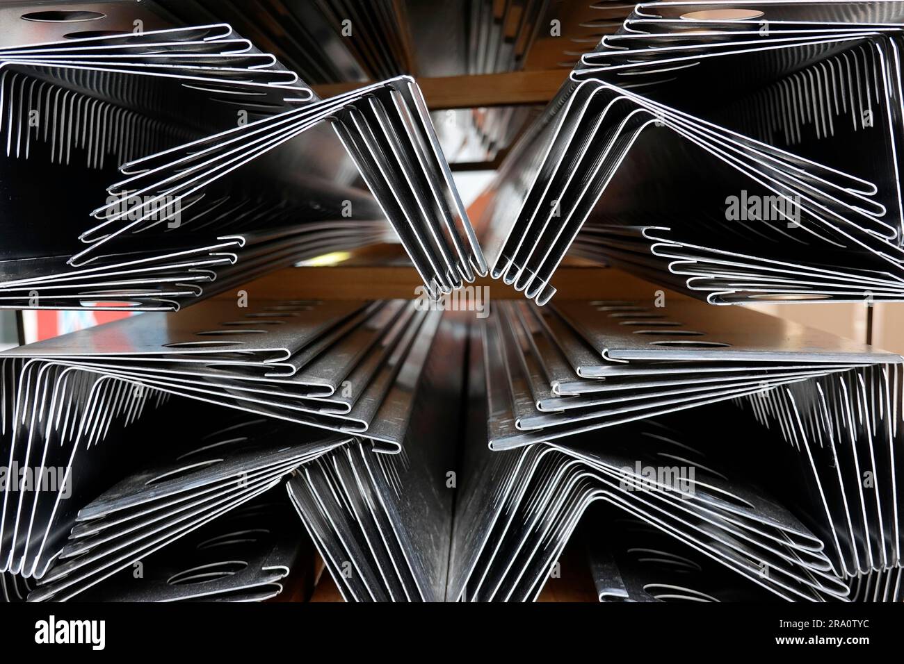 Folded metal sheets lying in front of a construction site, Berlin ...