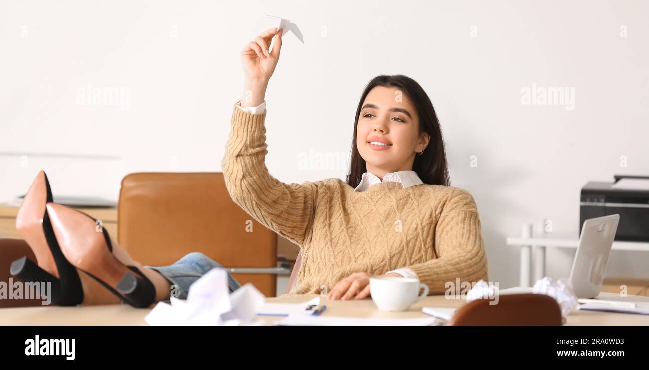 Businesswoman throwing paper table hi-res stock photography and images ...