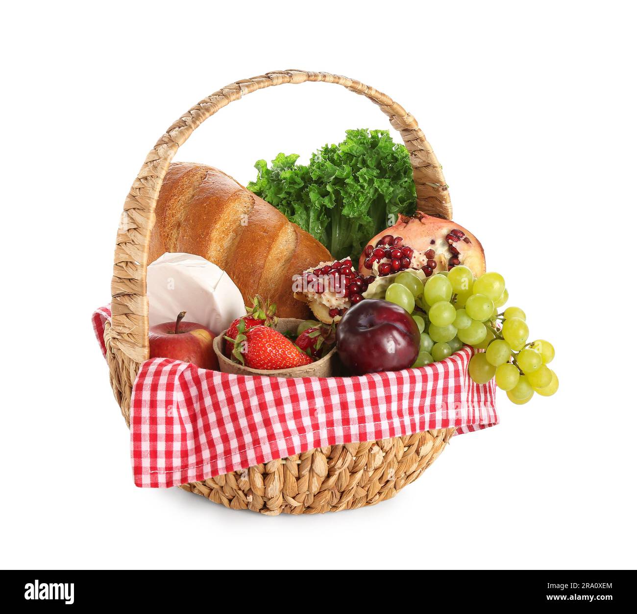 Wicker basket with delicious food for picnic on white background Stock ...