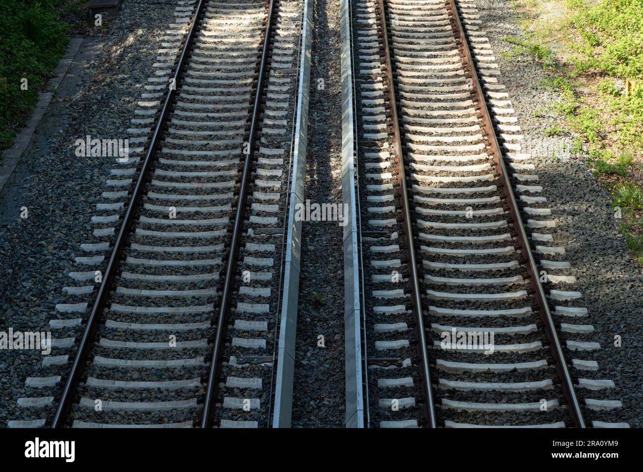 Railway tracks on a railway line in the green on the underground line ...