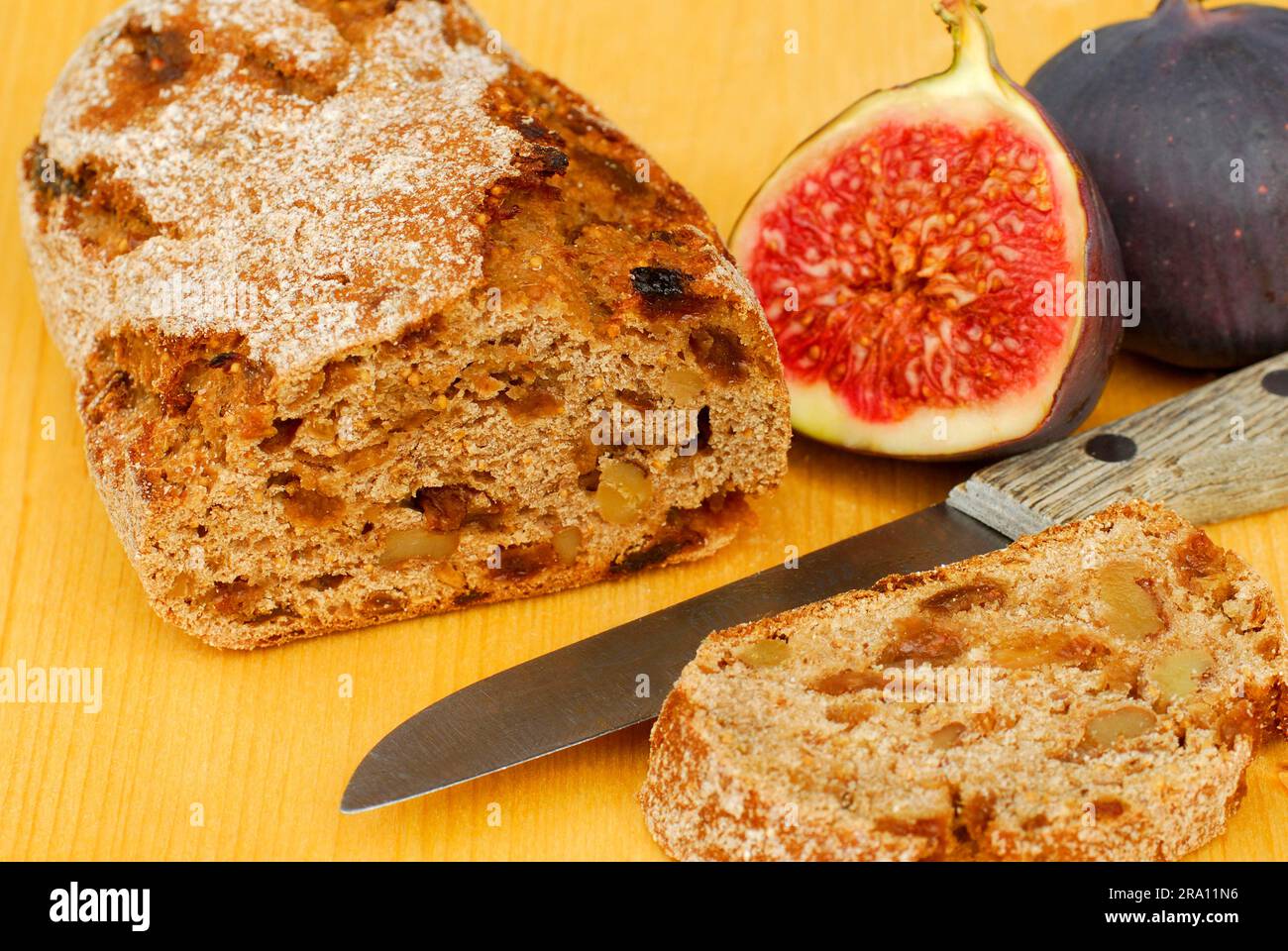 Bread with figs (Ficus carica) and walnuts, knife, fig bread, fig Stock Photo - Alamy