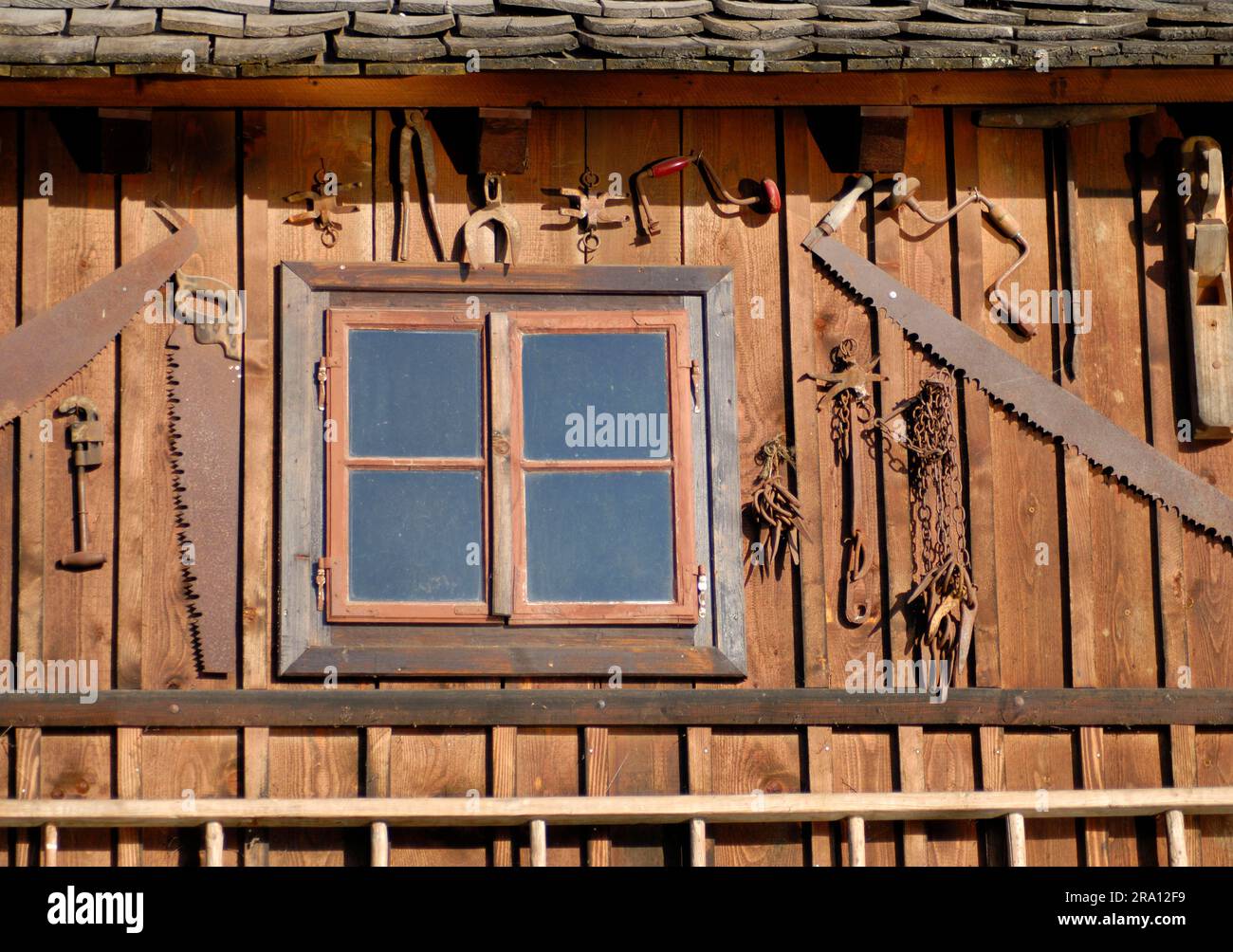 Traditional wooden house, tools around windows, Hallstatt, on Lake ...