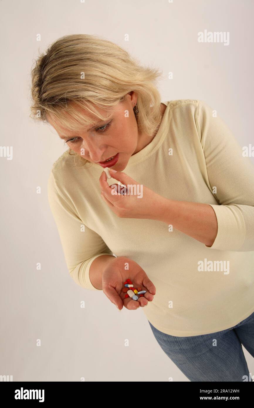 Woman takes tablet, taking, tablet addict, tablet addicted, tablet ...